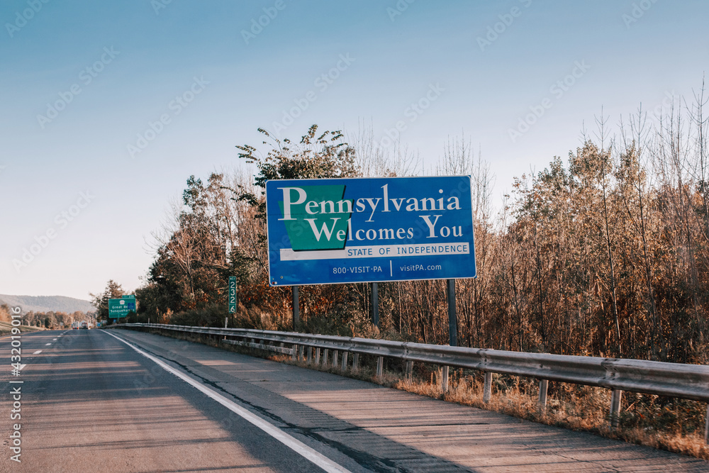 Street road sign saying Pennsylvania Welcomes You. Street road city ...