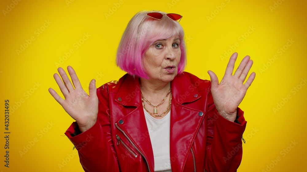 I am dont want it, not me. Confused senior granny woman rocker pointing ...