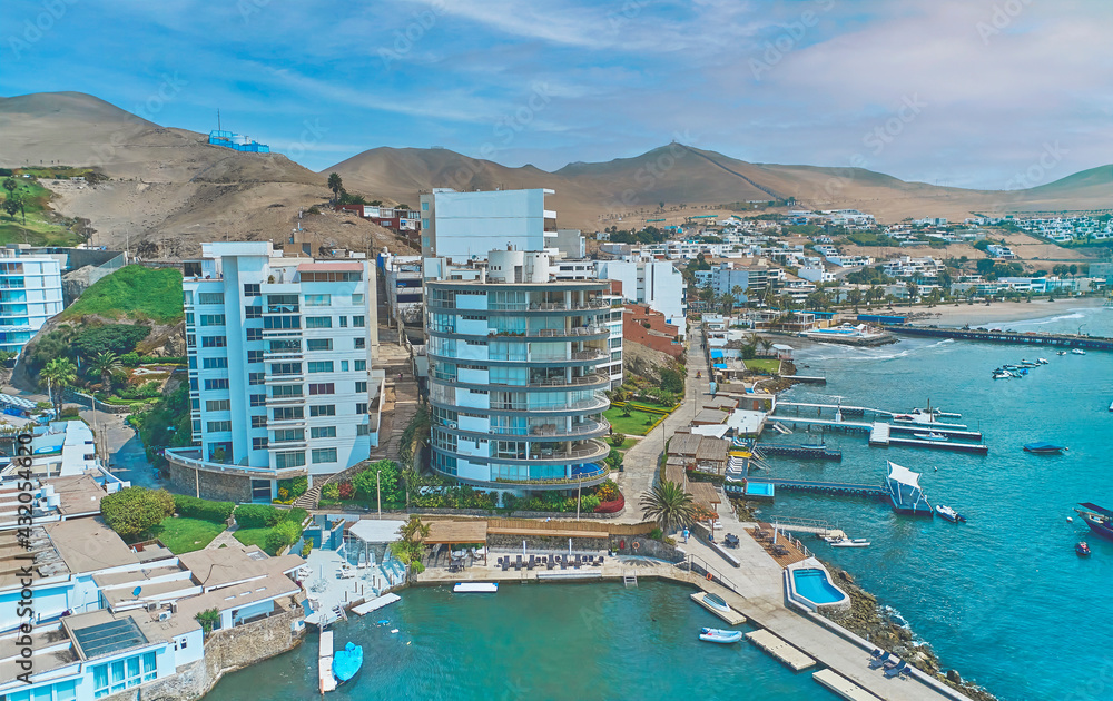 Aerial view of the bay, marina and buildings of Ancon - Lima, Peru; The ...