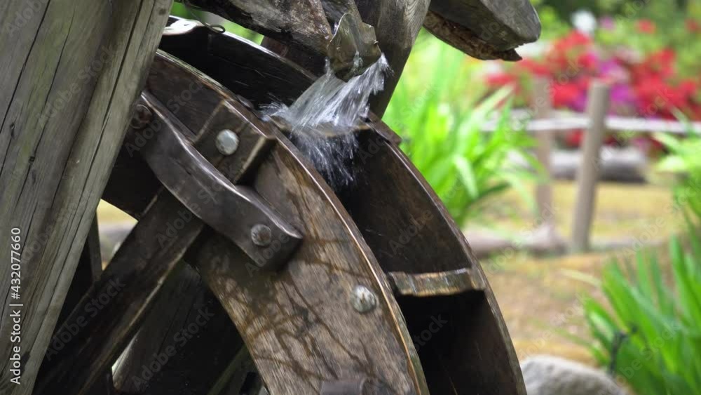 Wooden korean traditional water wheel spinning in the Namsan park in ...