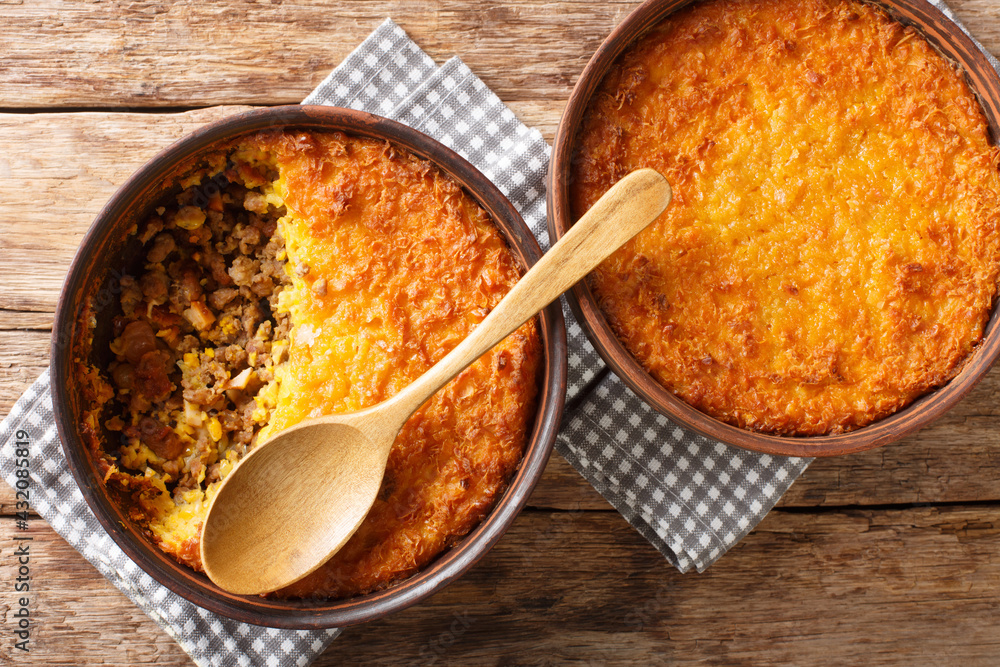 Shepherd's Corn Pie Chilean Pastel De Choclo closeup in the pots on the ...