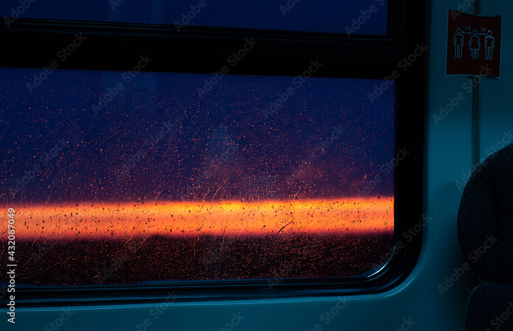 Rain drops is at the window of train Stock Photo | Adobe Stock