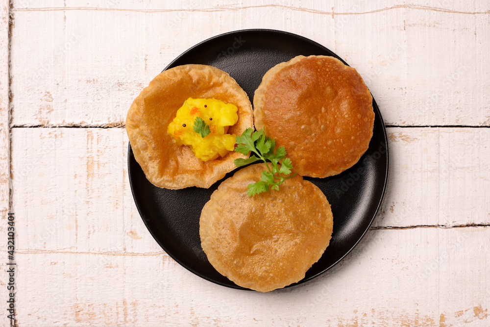 Puri Bhaji North Indian Poori with aalu bhaji , aalu sabji potato spicy ...