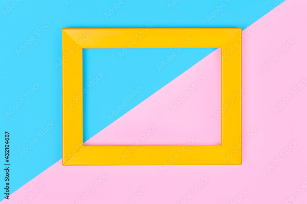 Simple yellow frame on pastel pink and blue background. Minimal border ...