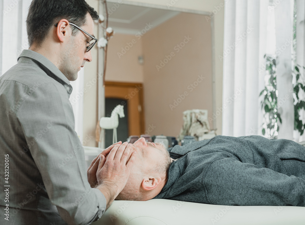 CST practitioner relieves compression in the bones of the head, sacrum ...