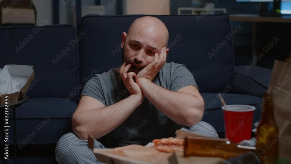 Close up of traumatized man going through a break up feeling ...