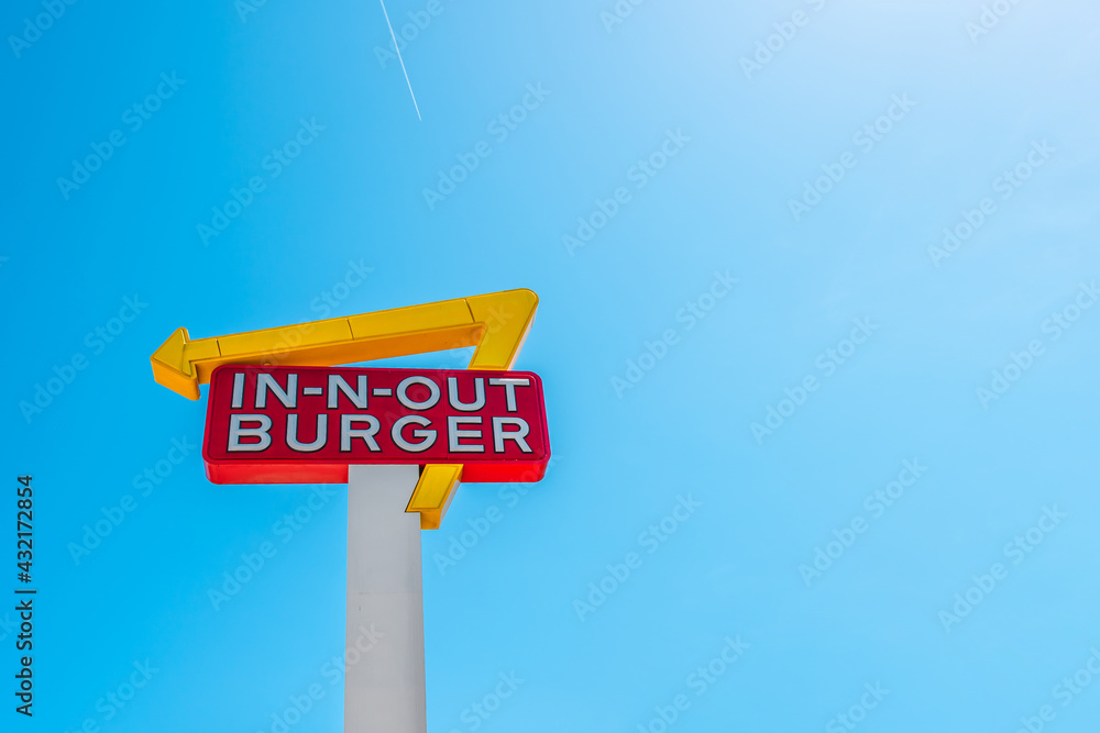 In-n-Out burger sign in front of blue sky. Los Angeles, USA - 16 Apr ...