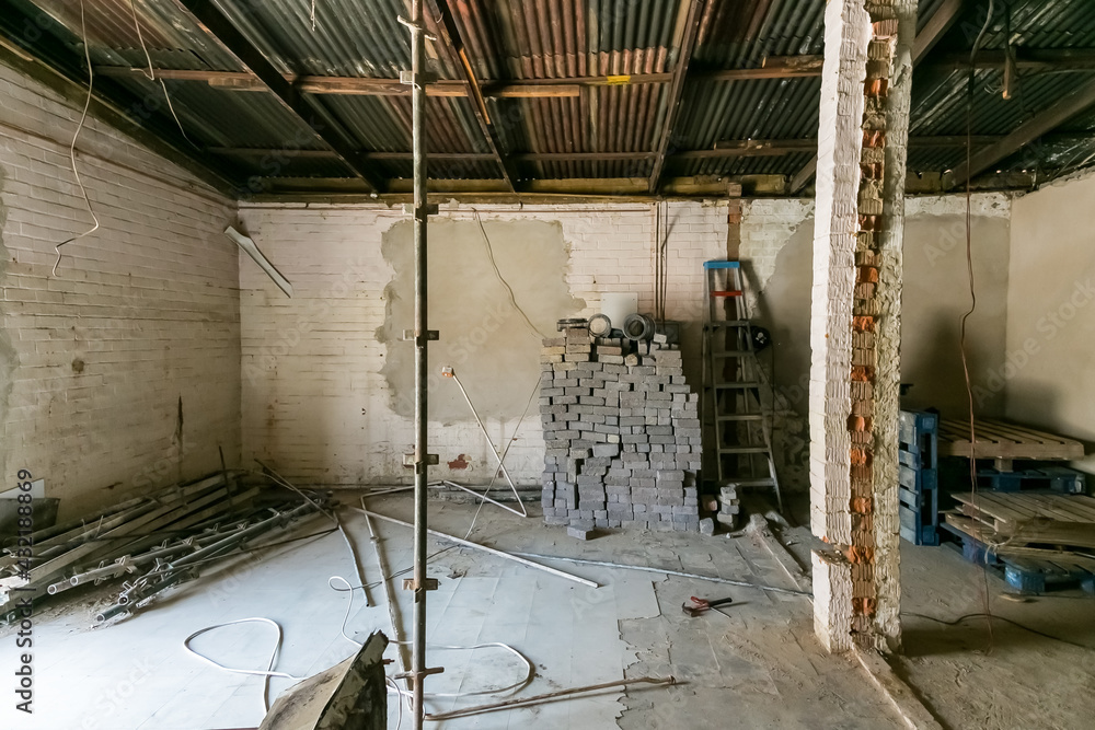 Inside interior of a small spaza shop grocery store undergoing ...
