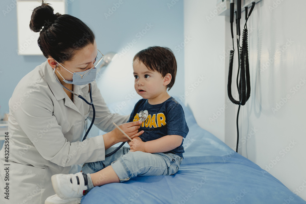 Dr. pediatrician with attending toddler Stock Photo | Adobe Stock