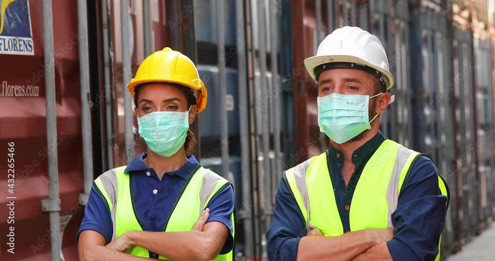 professional team man and woman worker wearing protection face mask ...