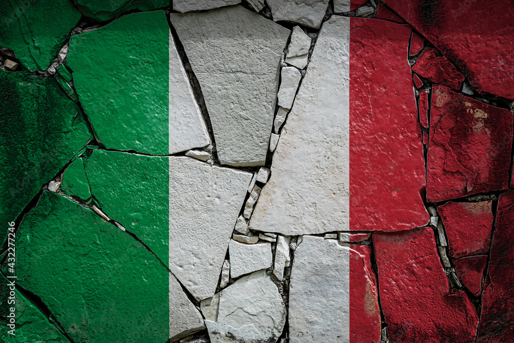 National flag of Italy. depicting in paint colors on an old stone wall ...