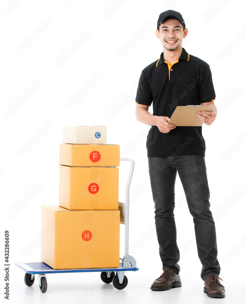 Joyful Asian delivery man smiling and holding delivery sheet next to ...