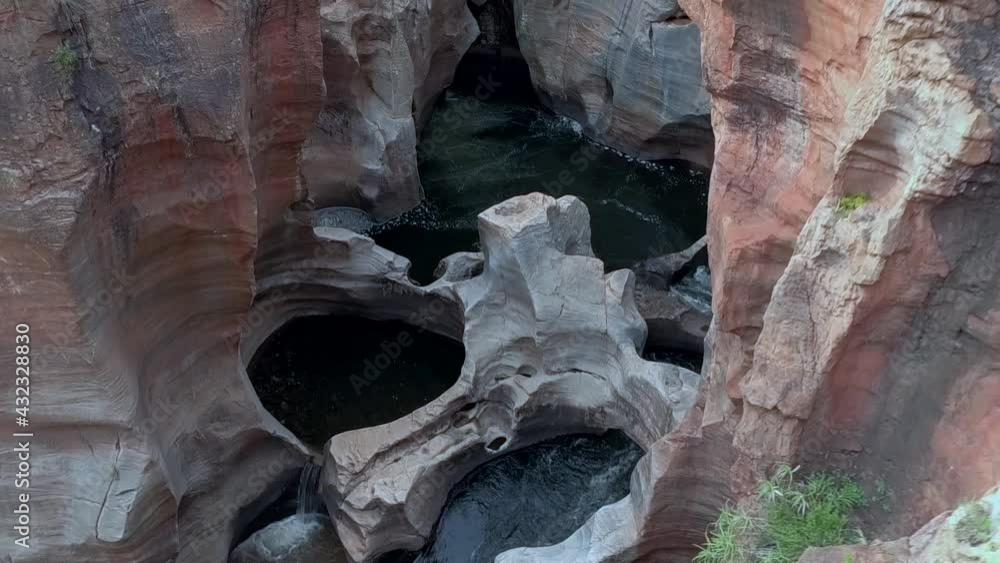 Desending aerial HD drone footage of beautiful natural rock formations ...