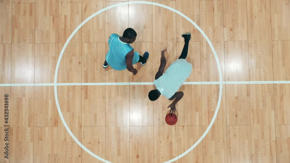 Basketball players are competing for a ball in a top view Stock 비디오 ...