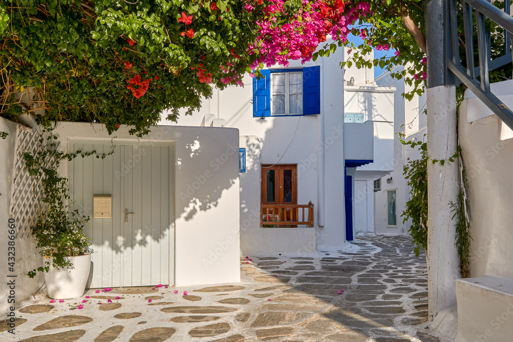Beautiful traditional streets of Greek island towns. Whitewashed houses ...