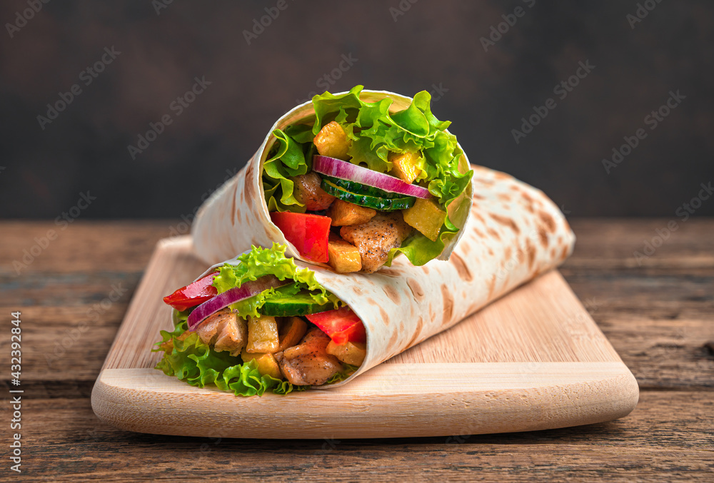 Traditional oriental shawarma close-up on a brown background. Stock ...