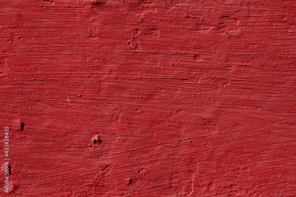 Texture of the red stucco wall with scratches, cracks, dust, crevices ...