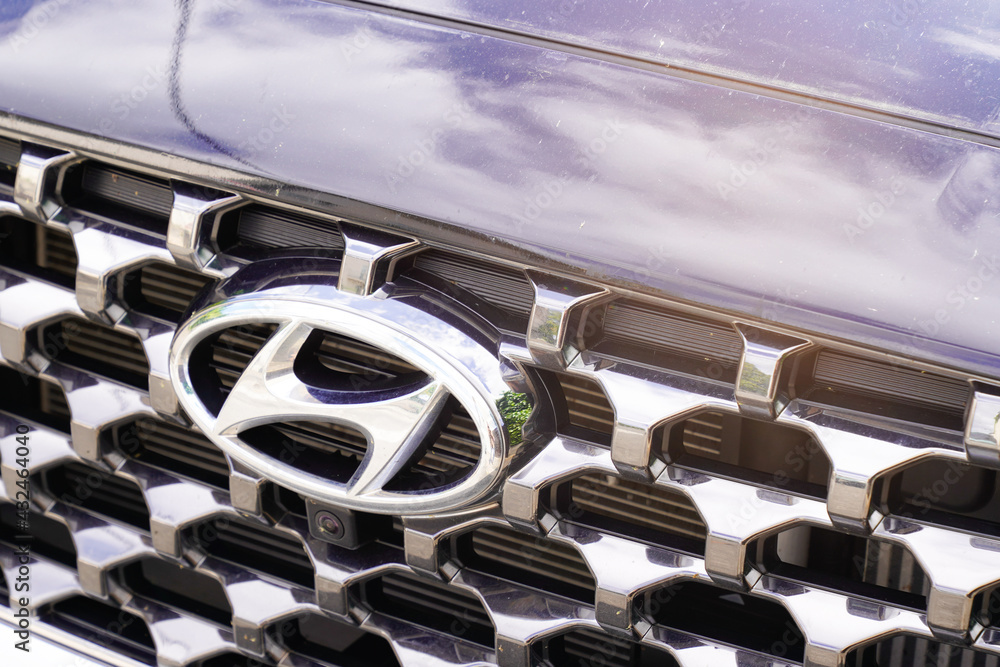 Hyundai logo brand and sign front of hood modern new suv car vehicle ...