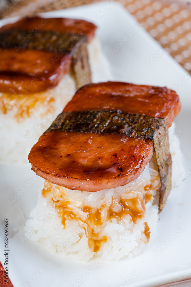 Spam musubi is a popular snack and lunch food in Japan that composed of ...