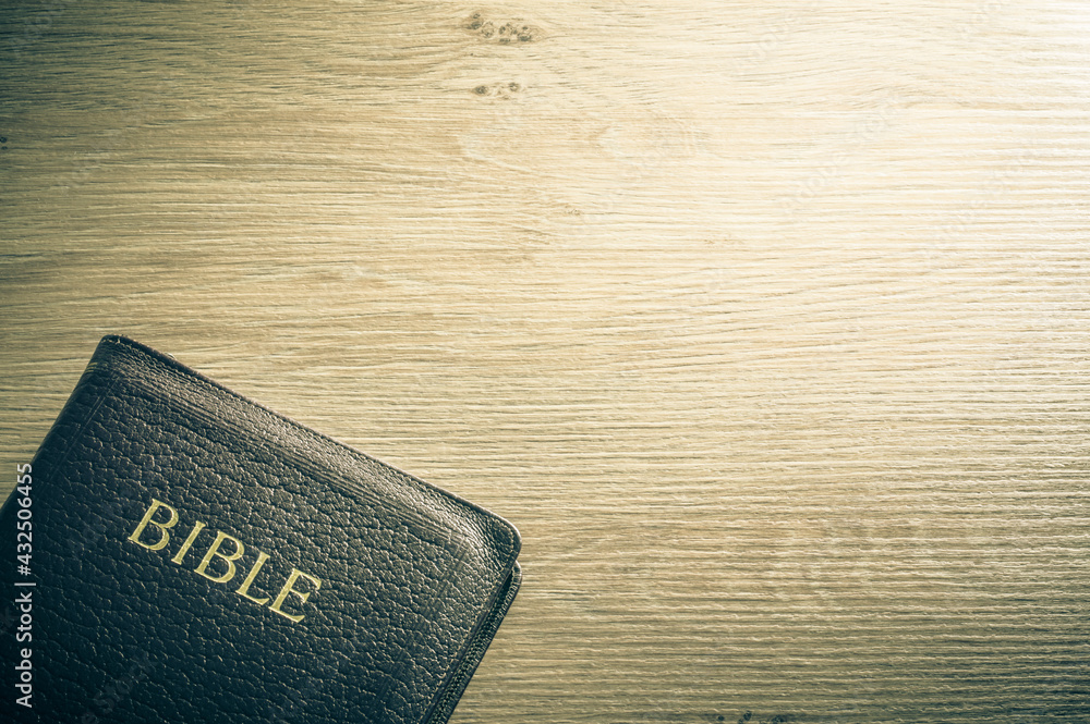 Bible and paper on wooden table background with large copy space Stock ...