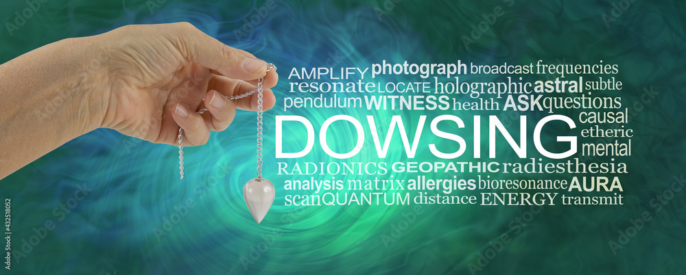 Words associated with Dowsing - female hand holding a clear quartz ...