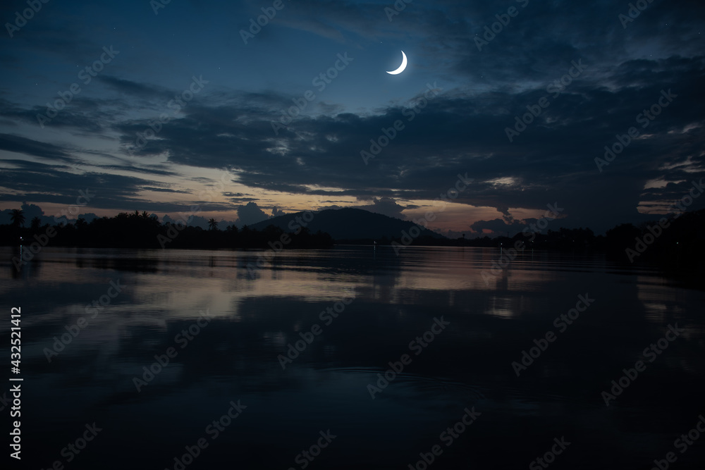 See the Islamic moon in the night sky. The evening sky and the vast ...
