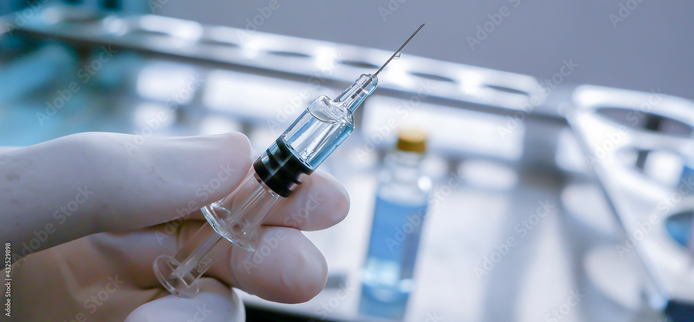 Trial vaccine coronavirus deverlopment vial dose flu shot drug needle ...