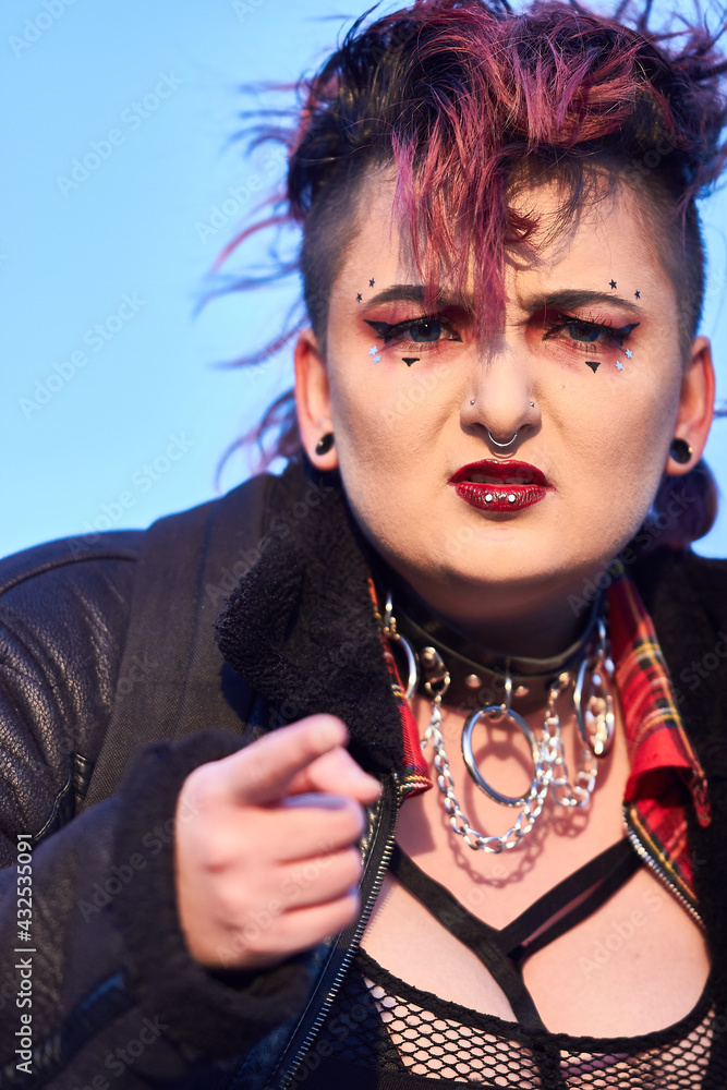 Alternative punk model smoking cigarettes and drinking buckfast on the ...