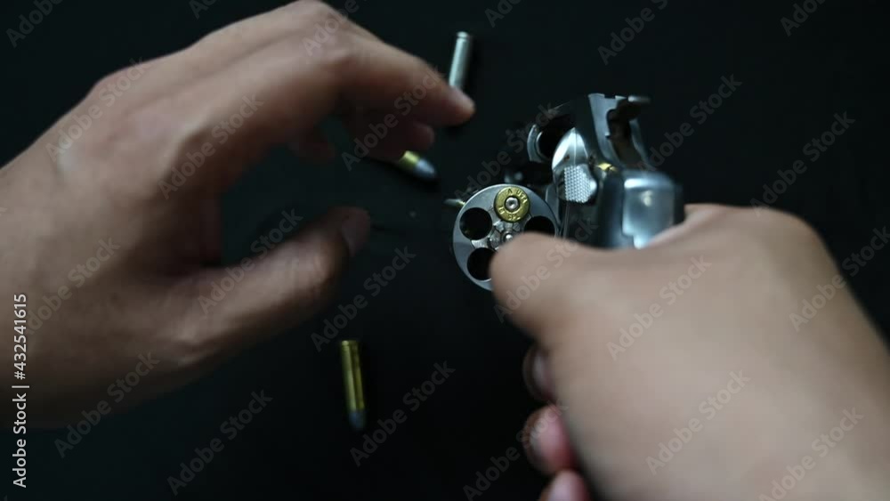 Reloading bullet,The compact revolver gun, Revolver Pistol on black ...