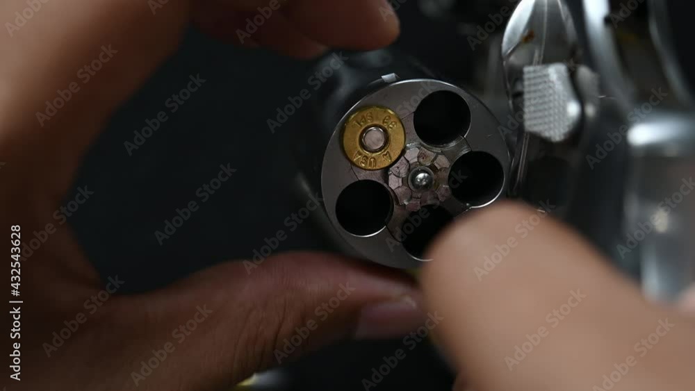 Reloading bullet,The compact revolver gun, Revolver Pistol on black ...