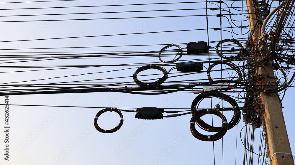 Internet cable reel and black box on electric cables. High speed fiber ...