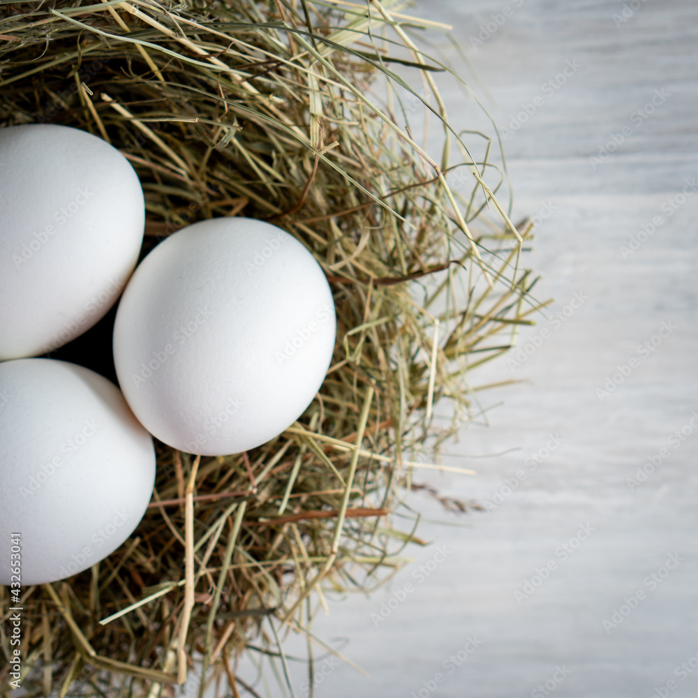 Closeup raw white brown organic fresh eggs shell with yolk from happy ...