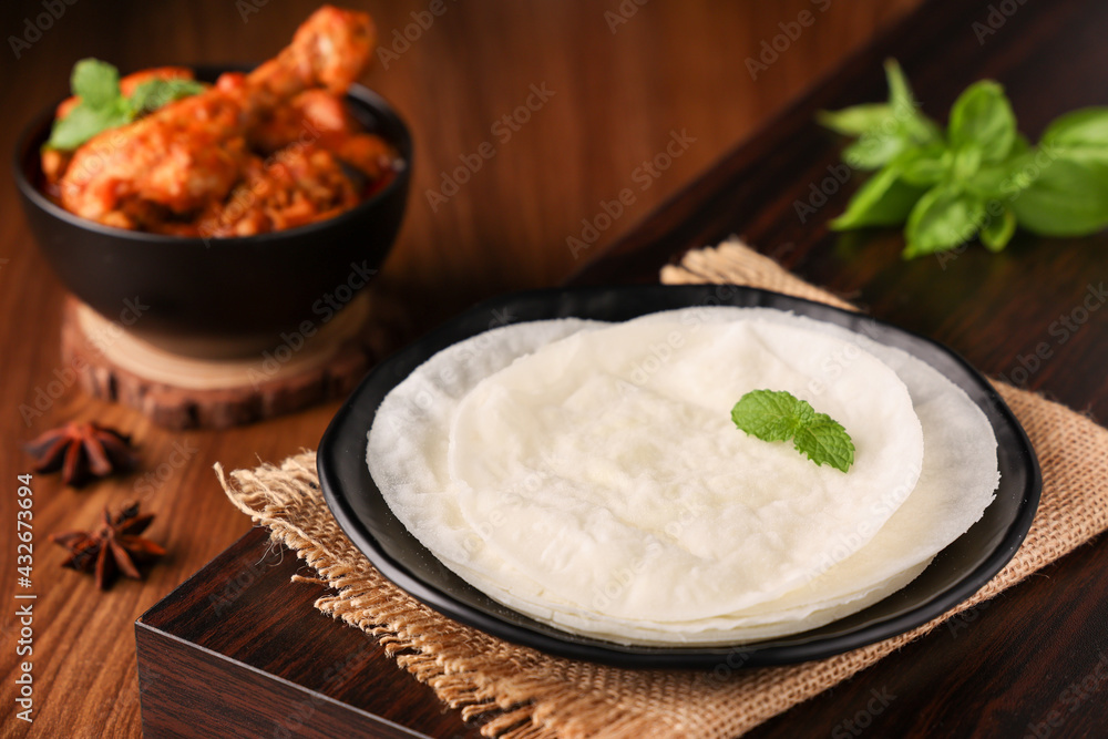 Rice pathiri Pathir flat bread with spicy chicken curry, Kerala Tamil ...