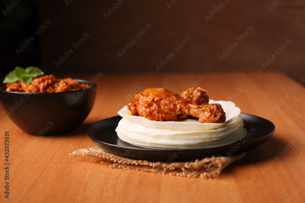 Rice pathiri Pathir flat bread with spicy chicken curry, Kerala Tamil ...
