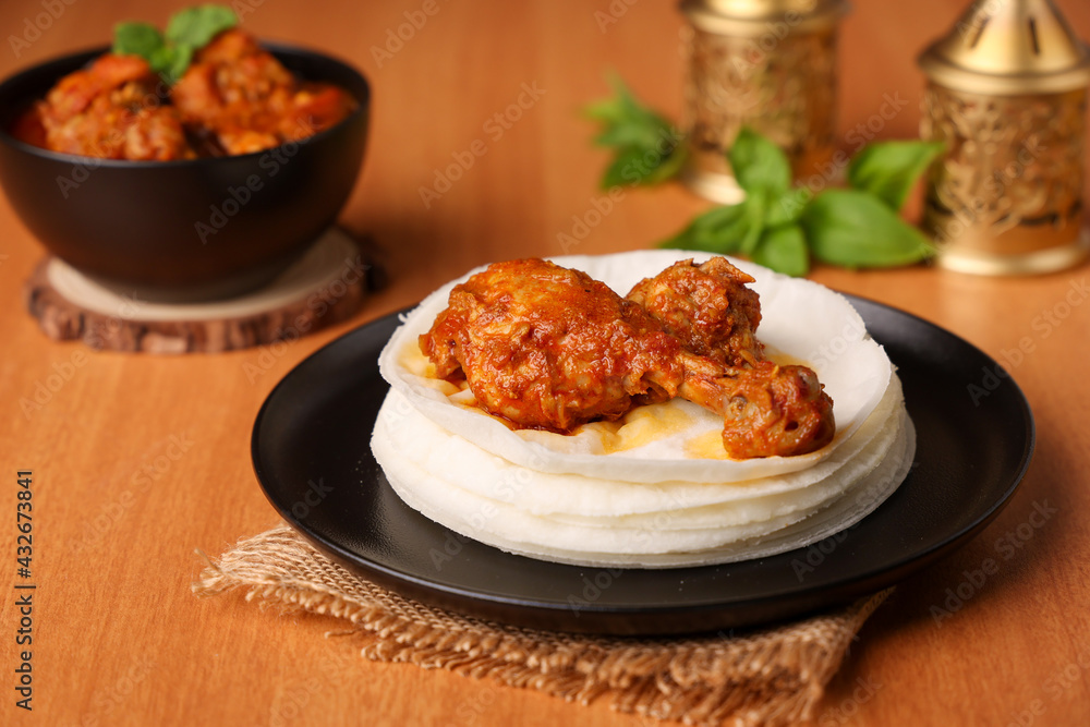 Rice pathiri Pathir flat bread with spicy chicken curry, Kerala Tamil ...