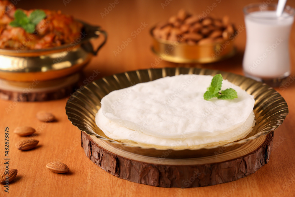 Rice pathiri Pathir flat bread with spicy chicken curry, Kerala Tamil ...