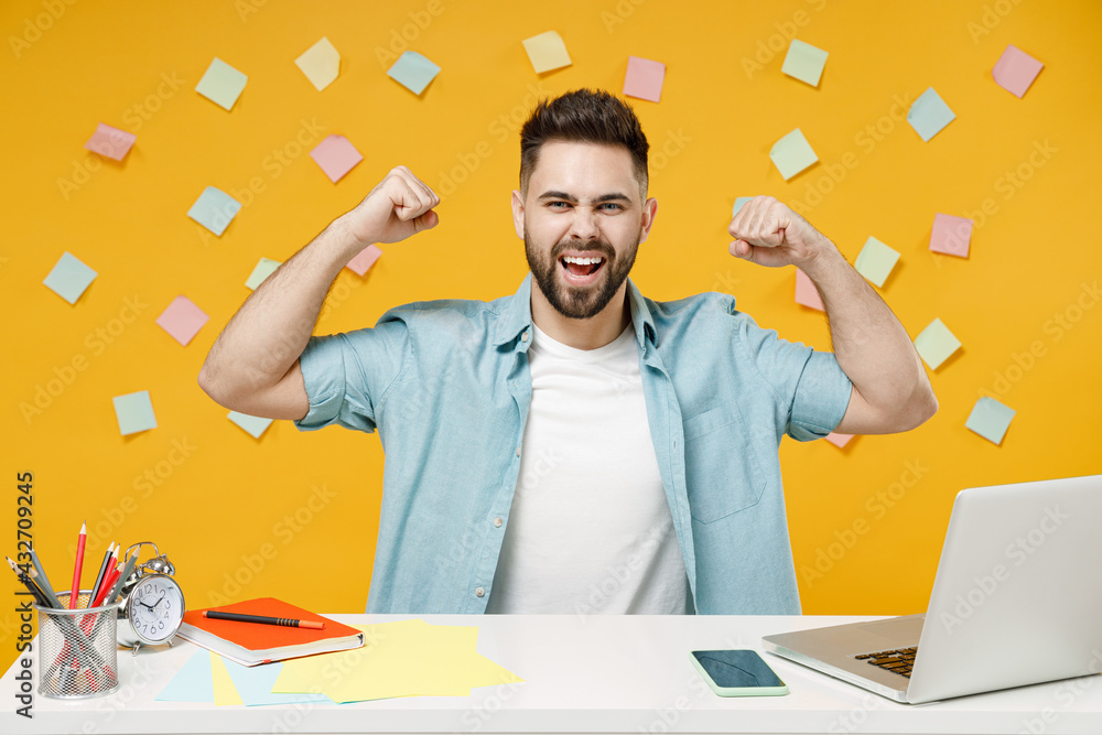 Young strong employee business man 20s in shirt sit work at white ...