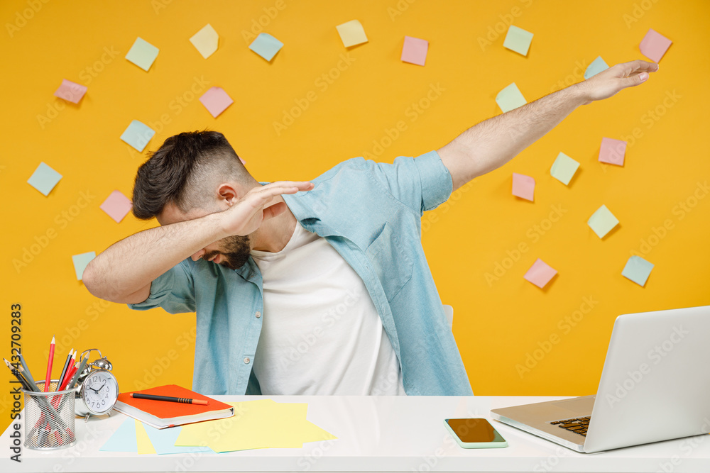 Young employee business man in shirt sit work at white office desk with ...