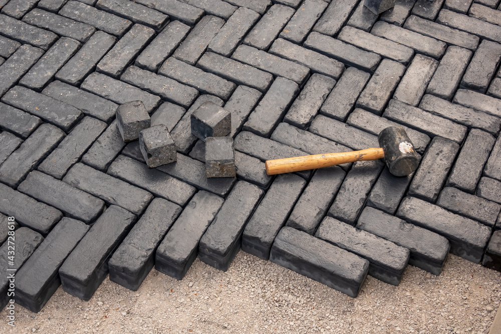 Paving stone driveway installation, 90 degree pattern laid by hand ...