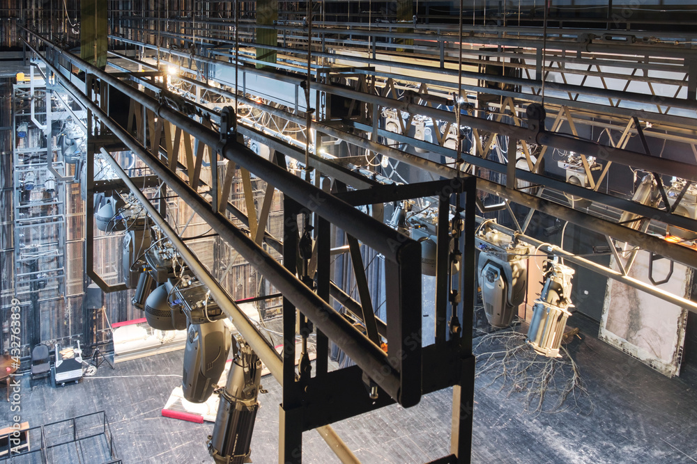 Technical equipment at the backstage of theater. Stage spot lighting ...