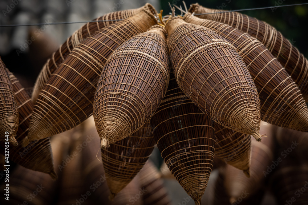 Craftsman making bamboo fish trap at old village, Hung Yen, Vietnam ...