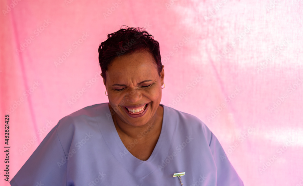 Portrait of Joyful Nurse Laughing Stock Photo | Adobe Stock