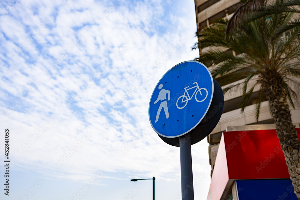Bicycle and pedestrian shared route sign in Dubai Stock Photo | Adobe Stock