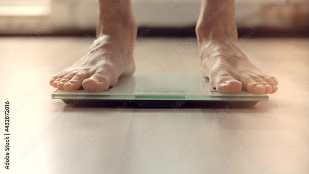 Man On Scales Measure Weight.Guy Legs Step On Bathroom Scale.Diet Man ...