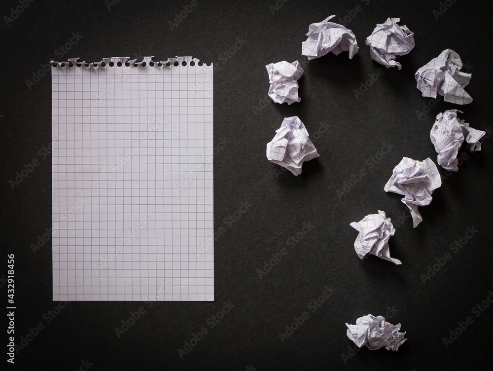 Blank white sheet of checkered notepad and question mark made from ...