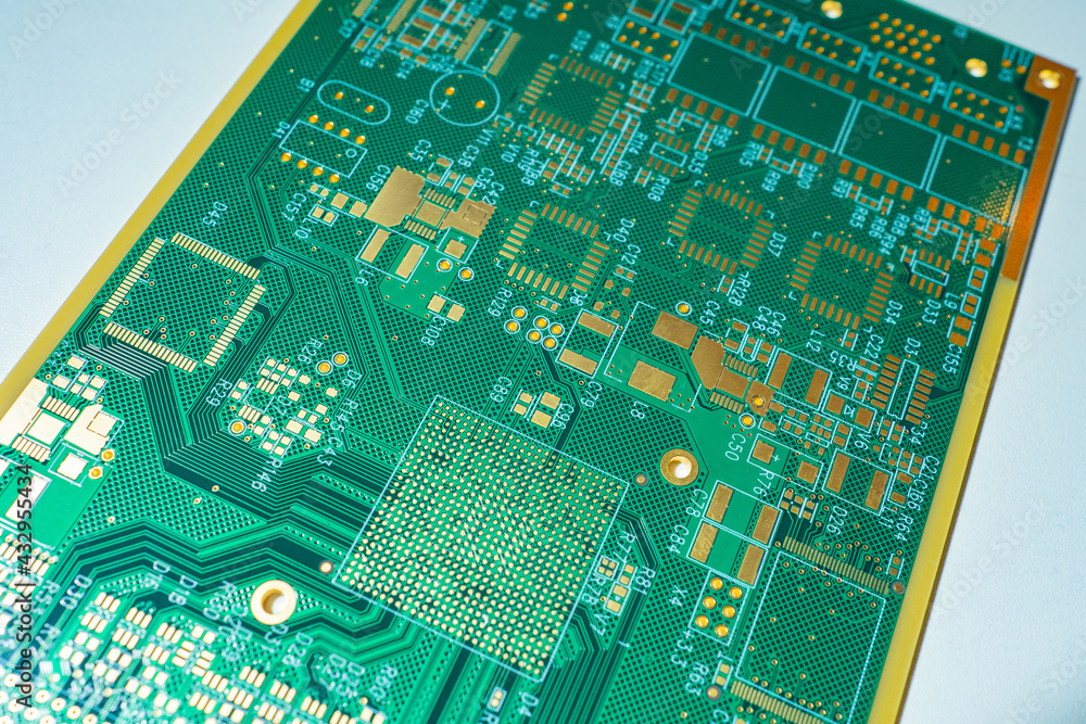 The green printed circuit board is located diagonally. A board for ...