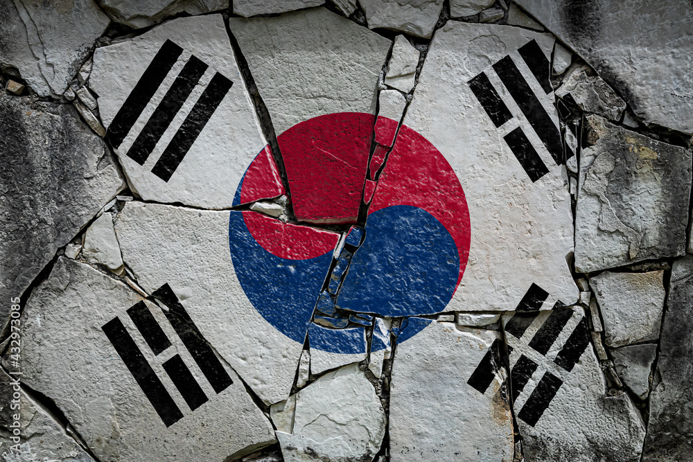 National flag of South Korea depicting in paint colors on an old stone ...