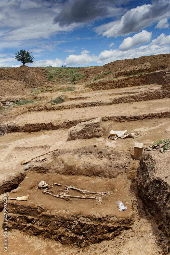 Archaeological excavations. Ancient grave with Human remains ...