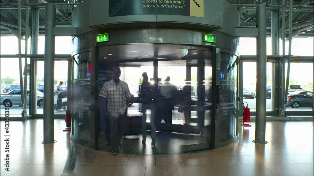 extraordinary long exposure time lapse shot of a revolving door at an ...