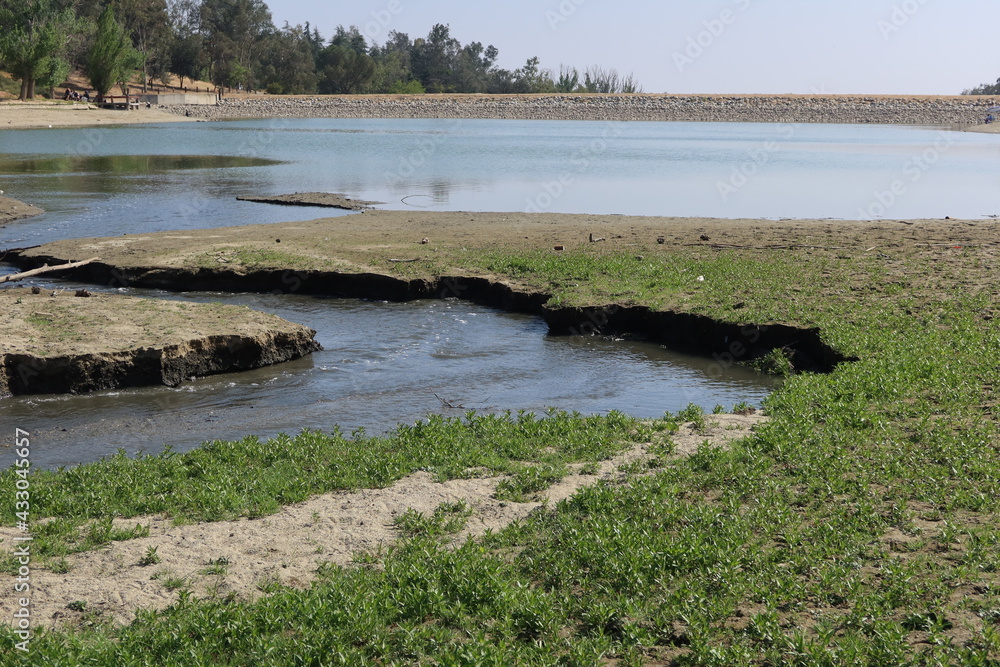 Water being Released into a Recreational Lake causing Erosion of the ...
